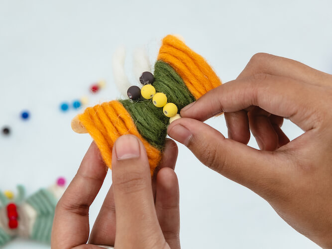 7 Simple and Colorful Yarn Crafts for Kids - Felt and Yarn